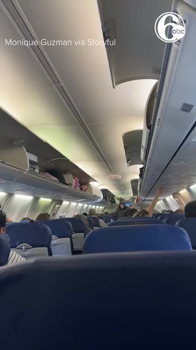 Woman seen inside overhead luggage compartment on Southwest flight ...